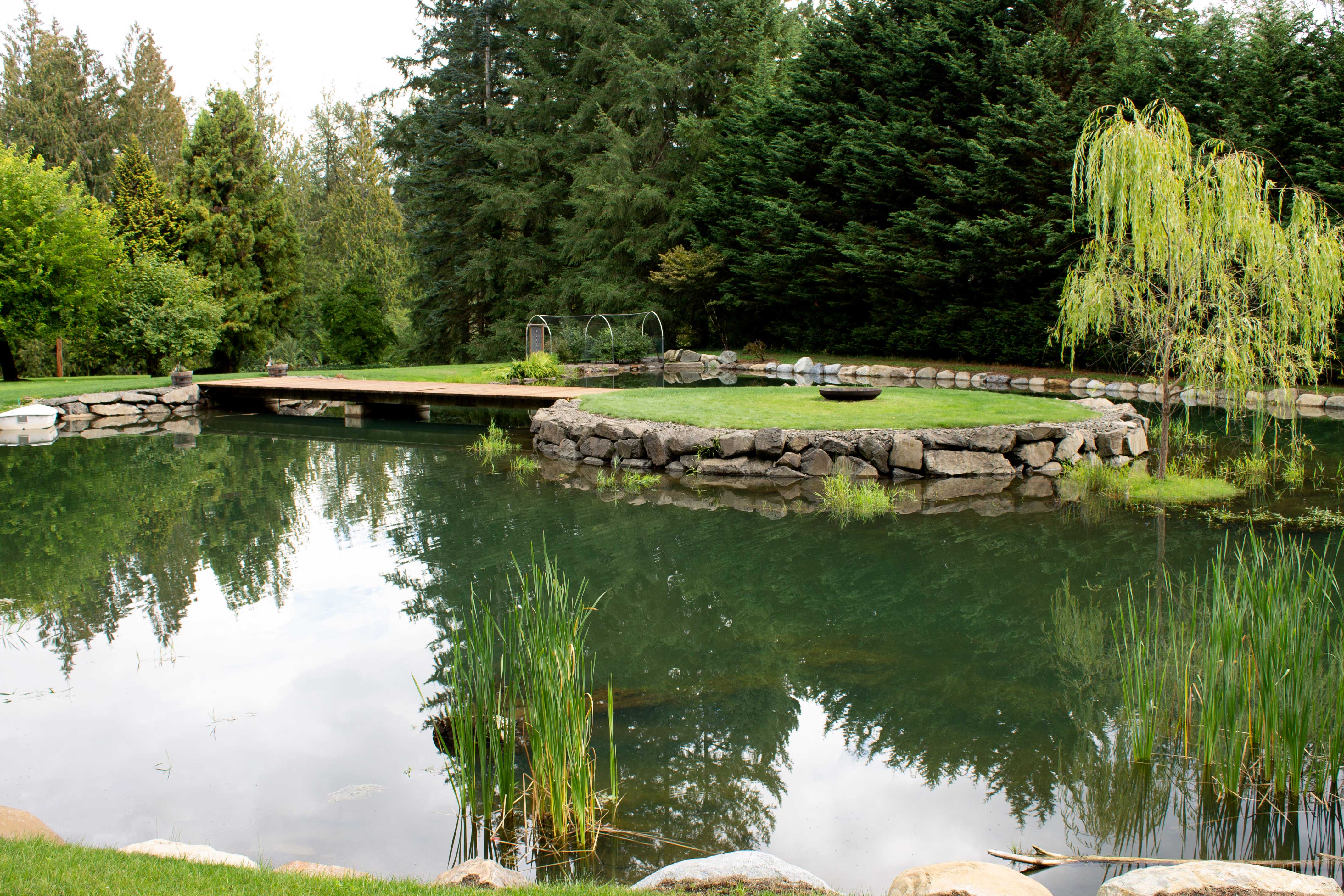 Finished product with usable land that is a perfect place to entertain ...